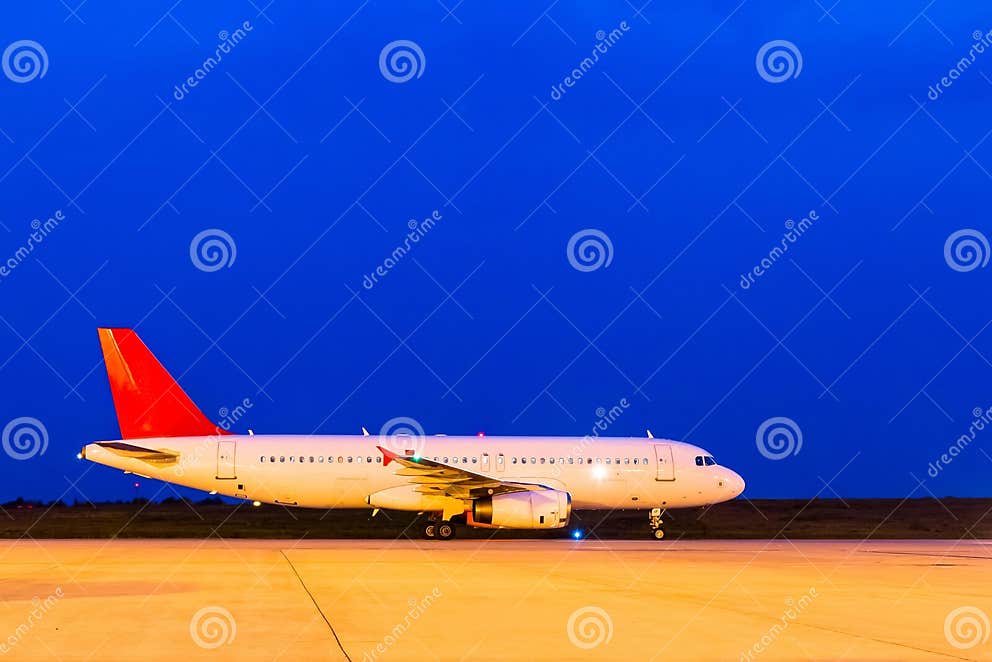 Airplane in blue hour stock photo. Image of departure - 43942140