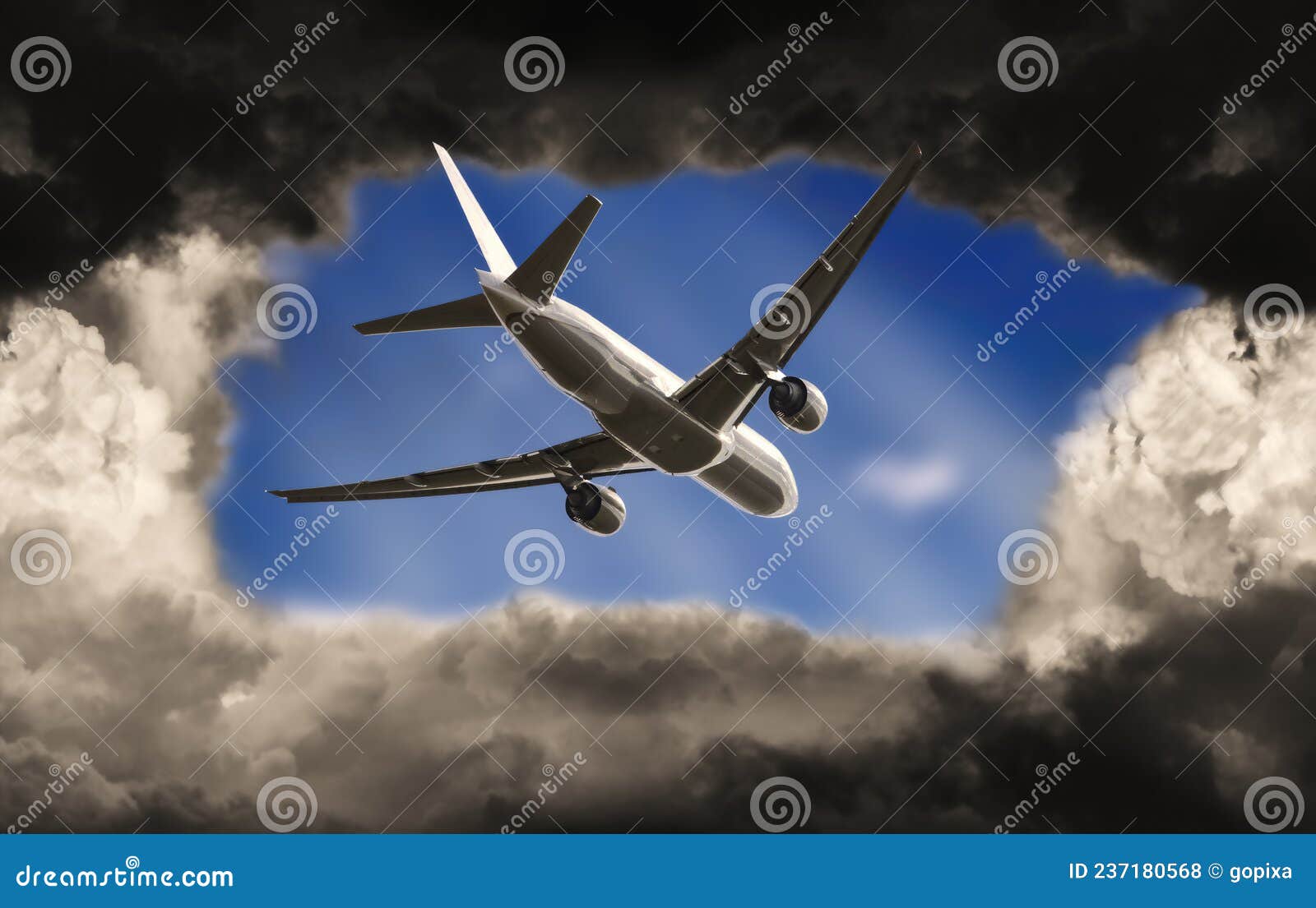 Airplane Breaks through Dark Clouds Stock Photo - Image of itchy ...