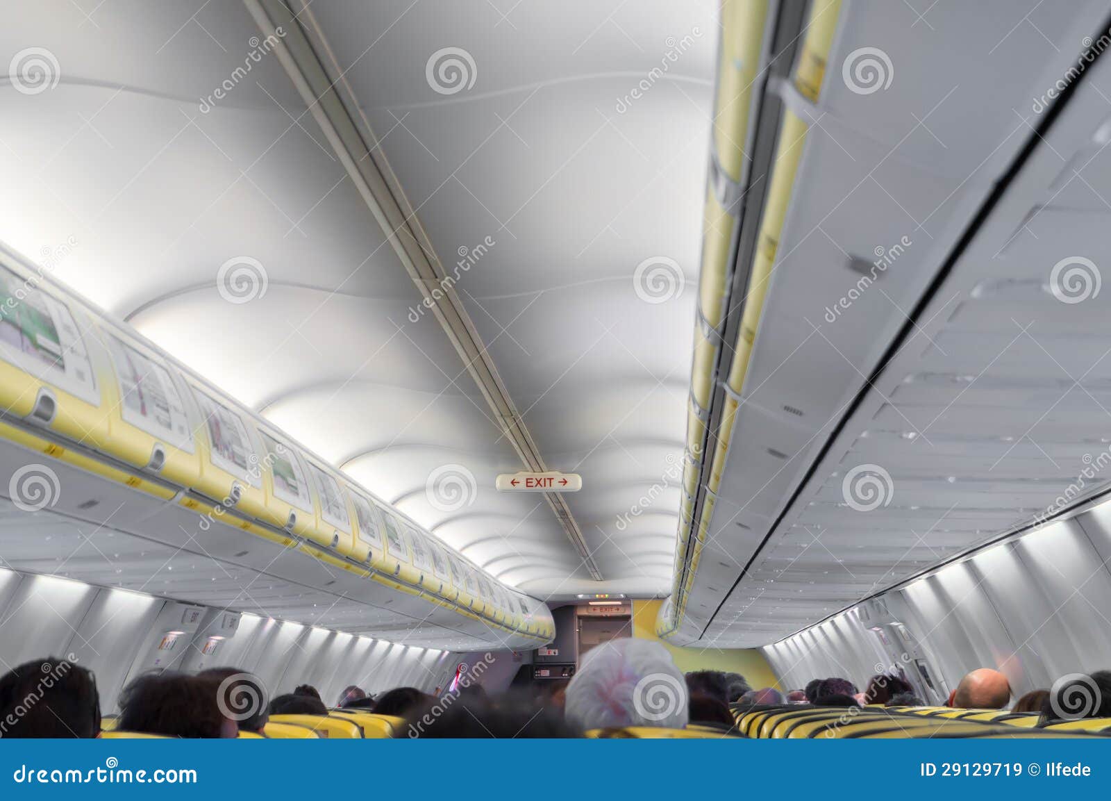 Airplane Cabin with Passengers Stock Image - Image of flying, airplane ...