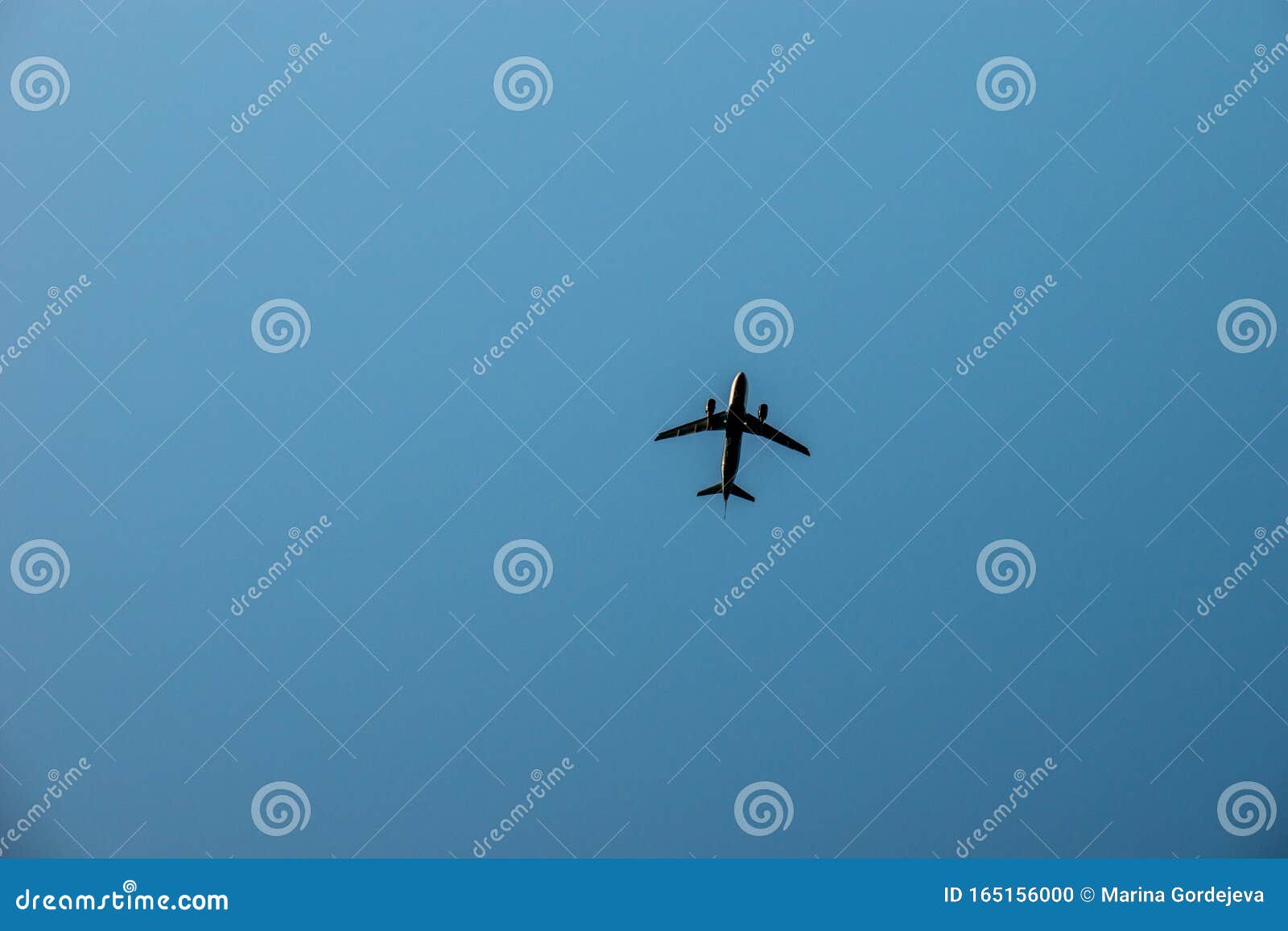 Airplane in the Clear Sky at Sunset. Airliner Landing or Taking Off ...