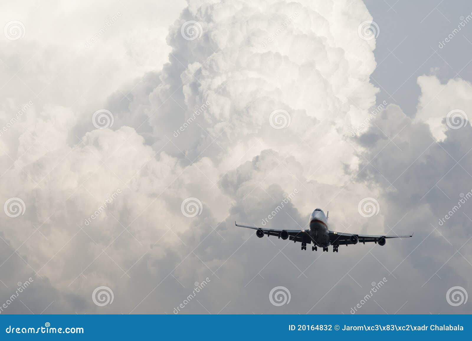 Airplane in clouds stock photo. Image of meteorology - 20164832