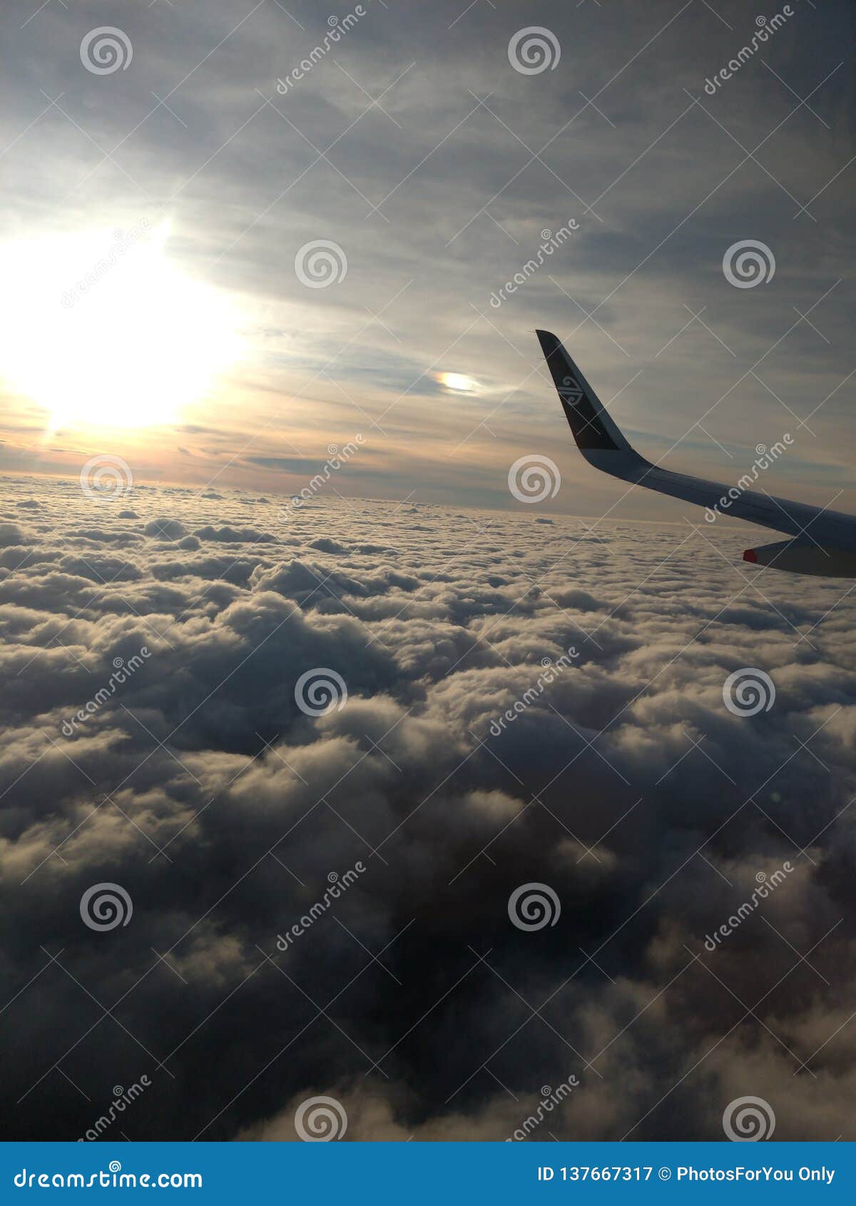 Airplane with the Clouds Along with the Sun Editorial Photography ...