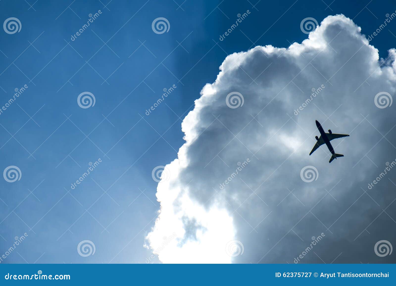 Airplane in the clouds stock image. Image of business - 62375727