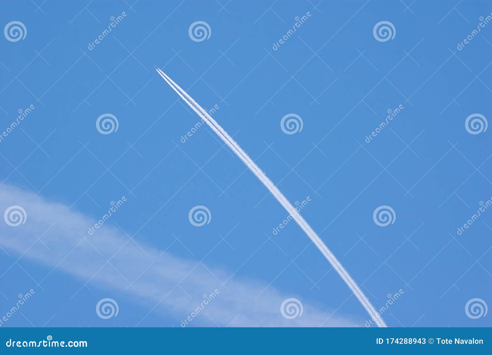 Airplane Contrail Against almost Clear Blue Sky Stock Image - Image of ...