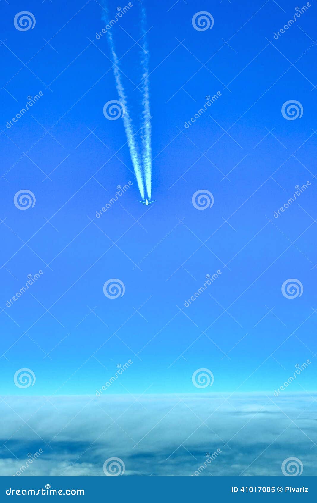 Airplane with contrails stock image. Image of contrails - 41017005