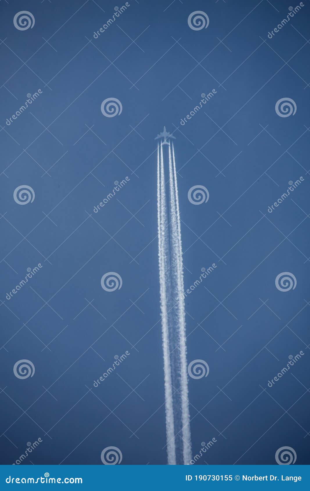 Airplane with Contrails in the Blue Summer Sky Stock Image - Image of ...