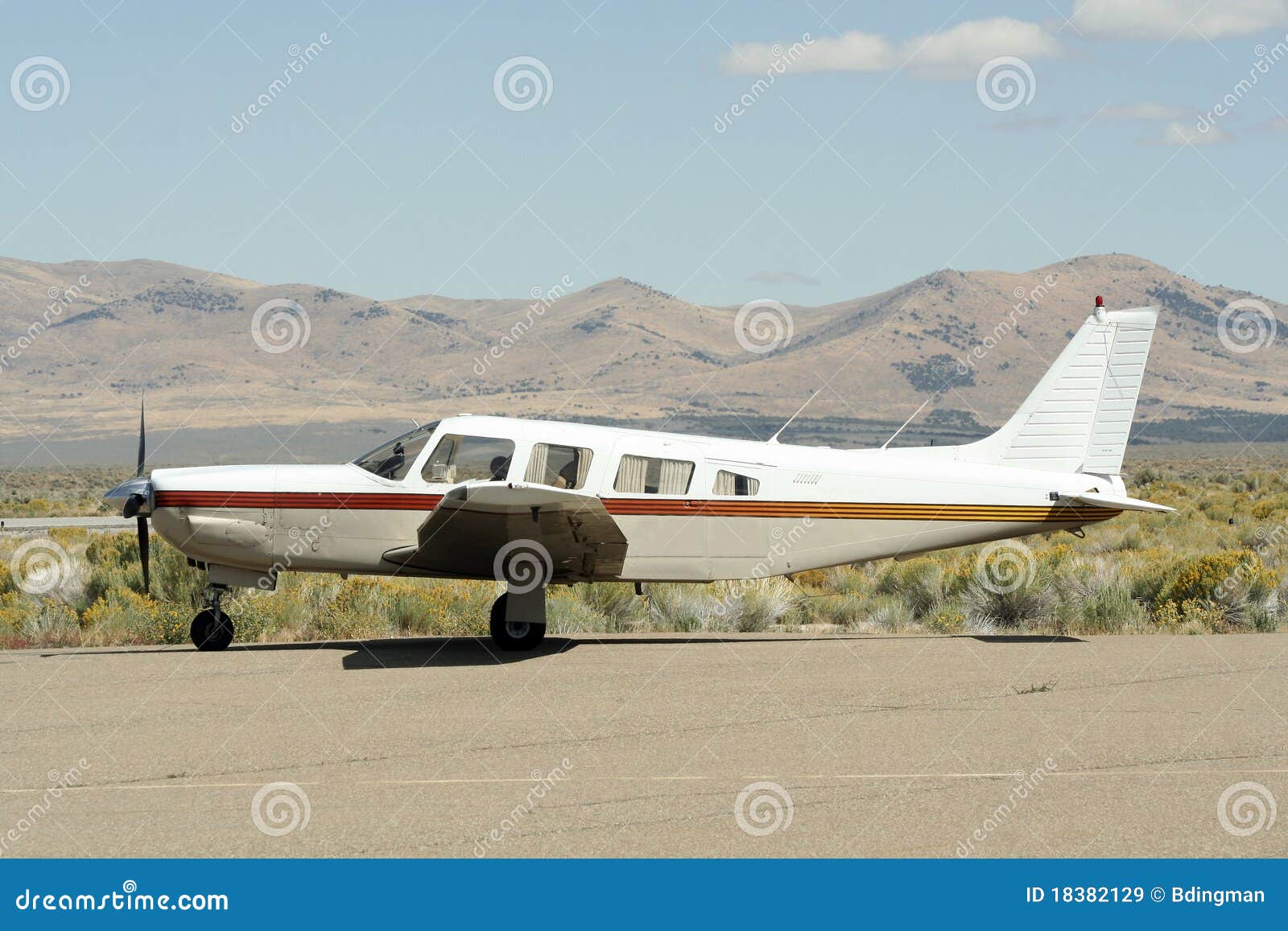 Airplane at Desert Airstrip Stock Image - Image of landing, airport ...