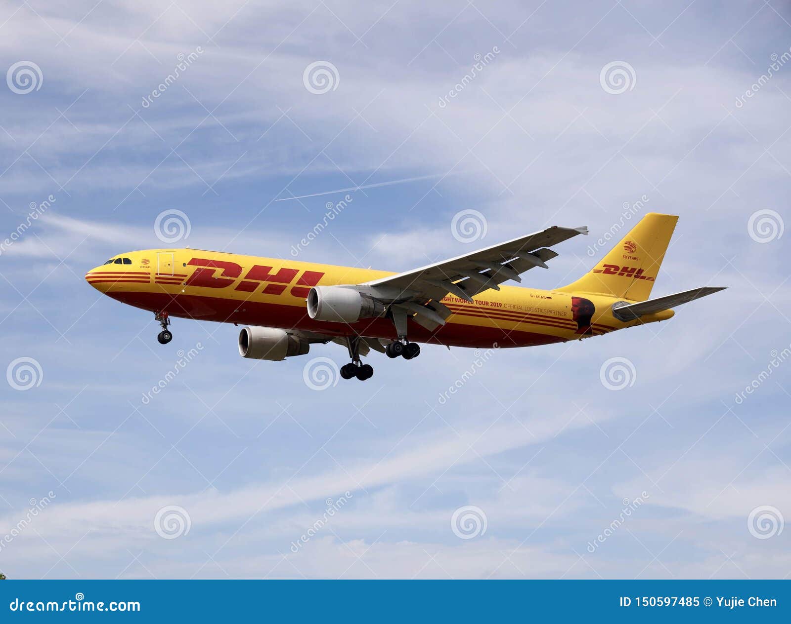 A Airplane of DHL Express Flying in the Sky Editorial Image - Image of ...