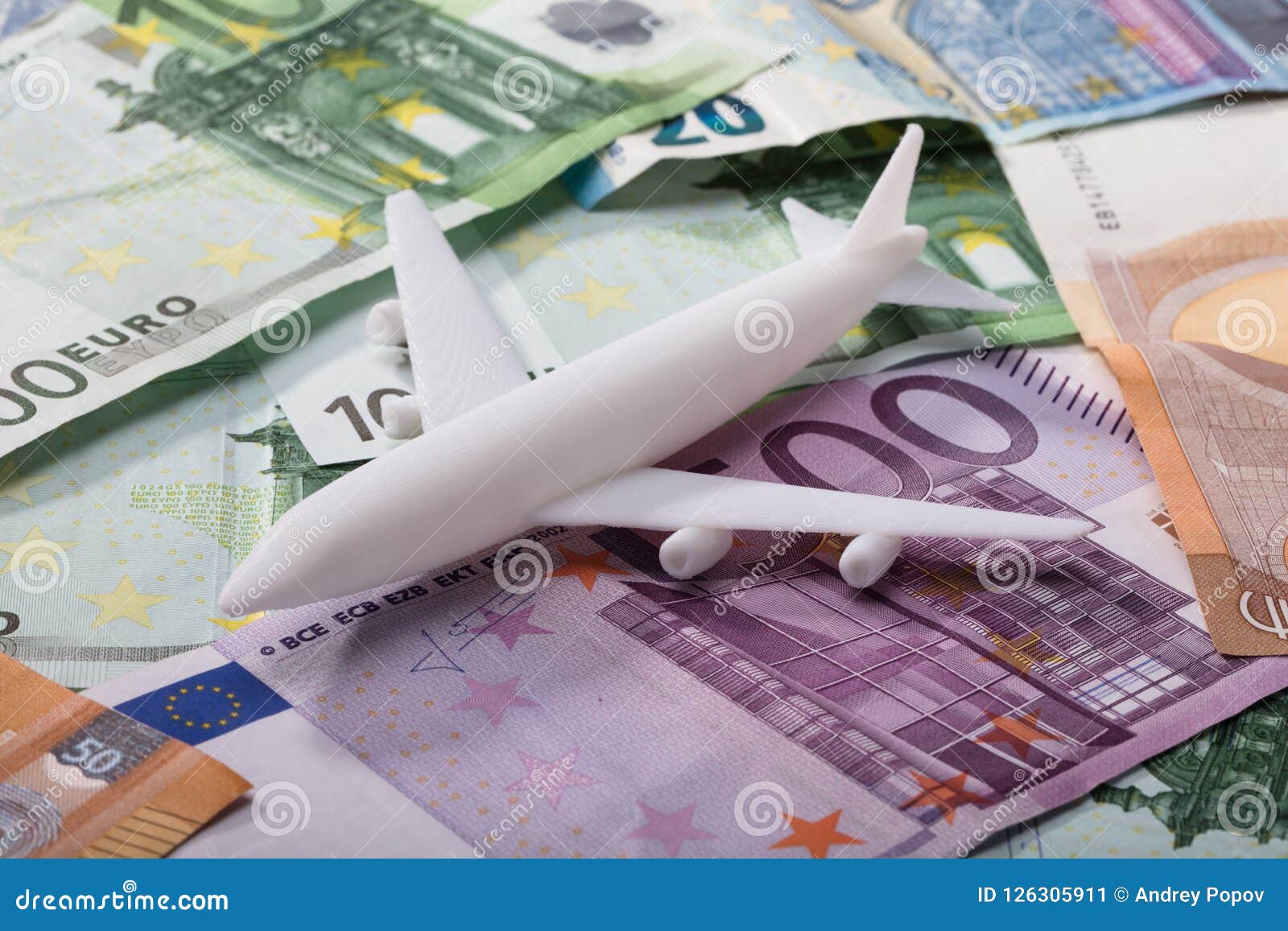 Airplane on Euro Banknotes stock image. Image of holiday - 126305911