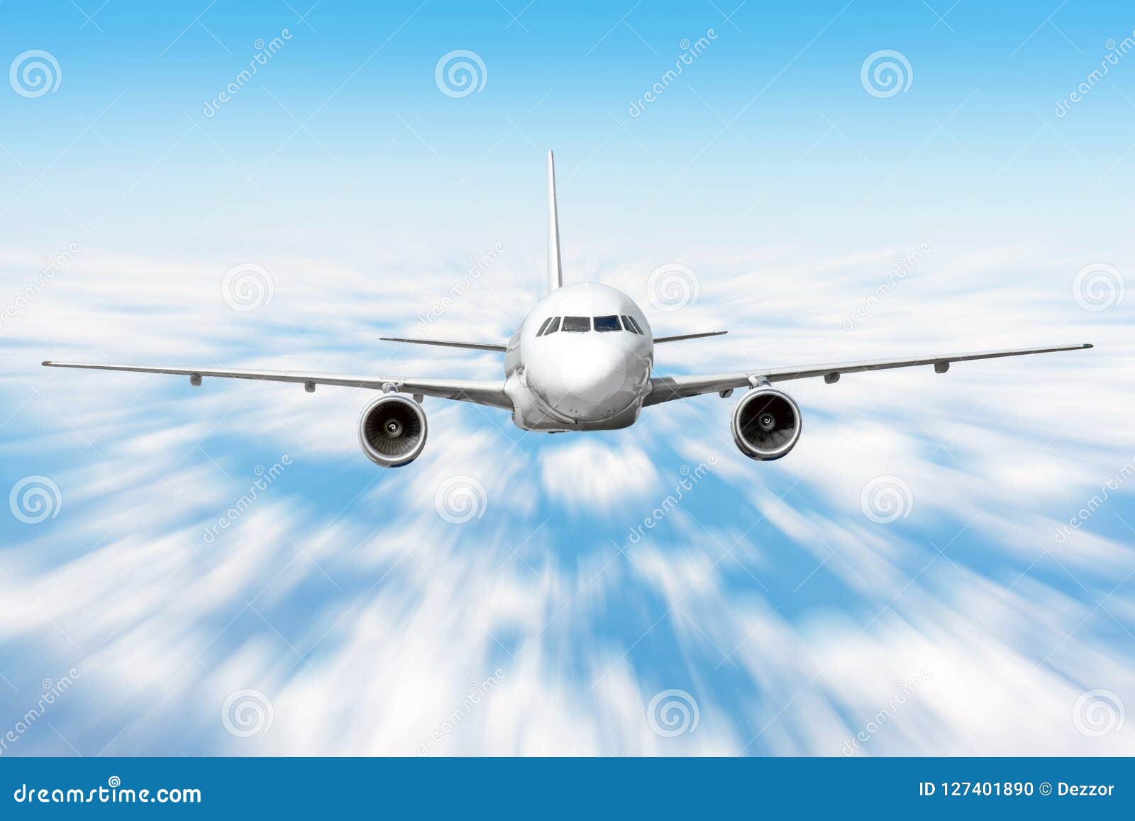 Airplane Flies High in the Sky Above the Clouds, with the Effect Motion ...