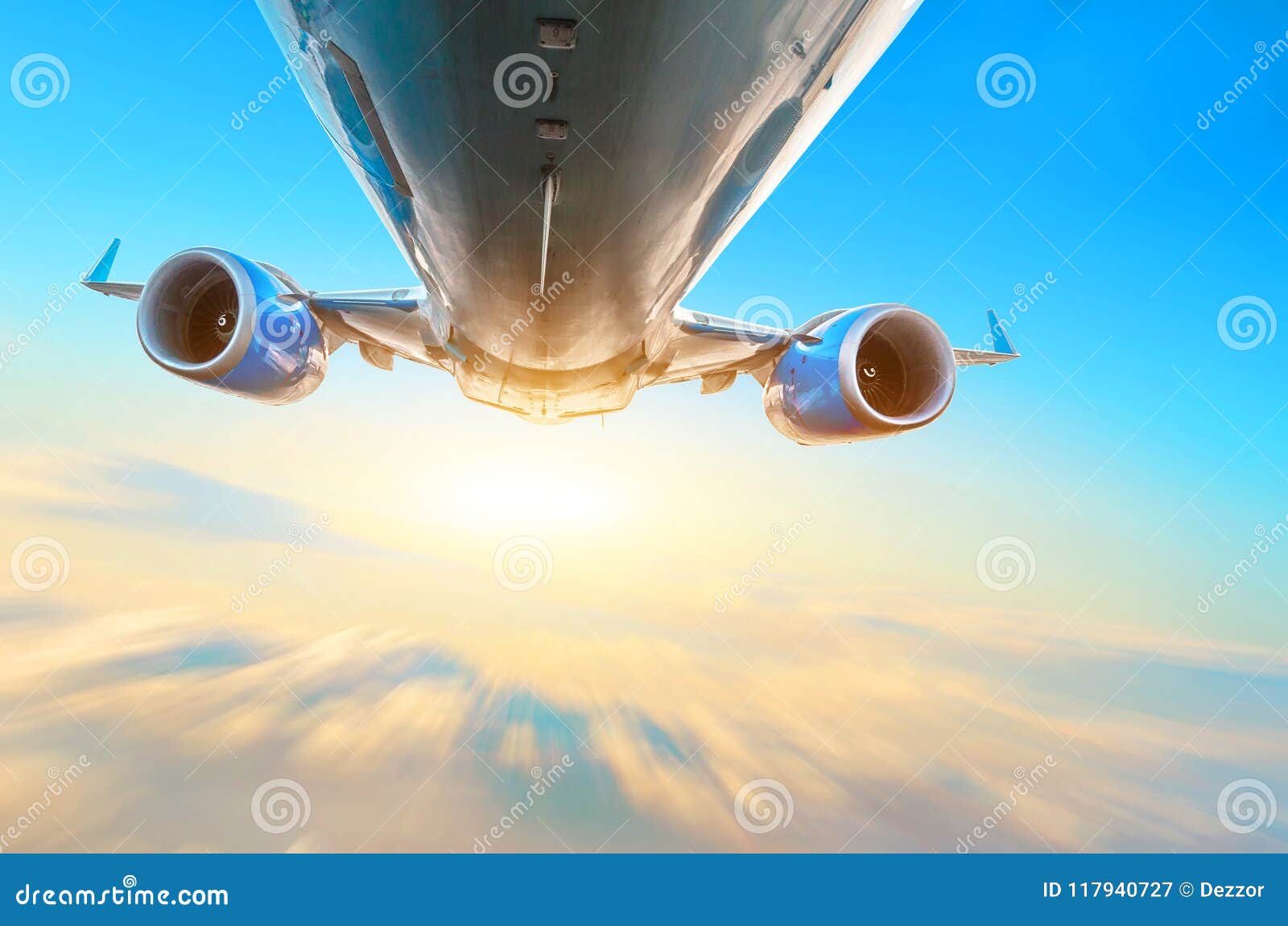 Airplane Flies Over The Clouds In The Sky. View Of The Fuselage, Wings ...