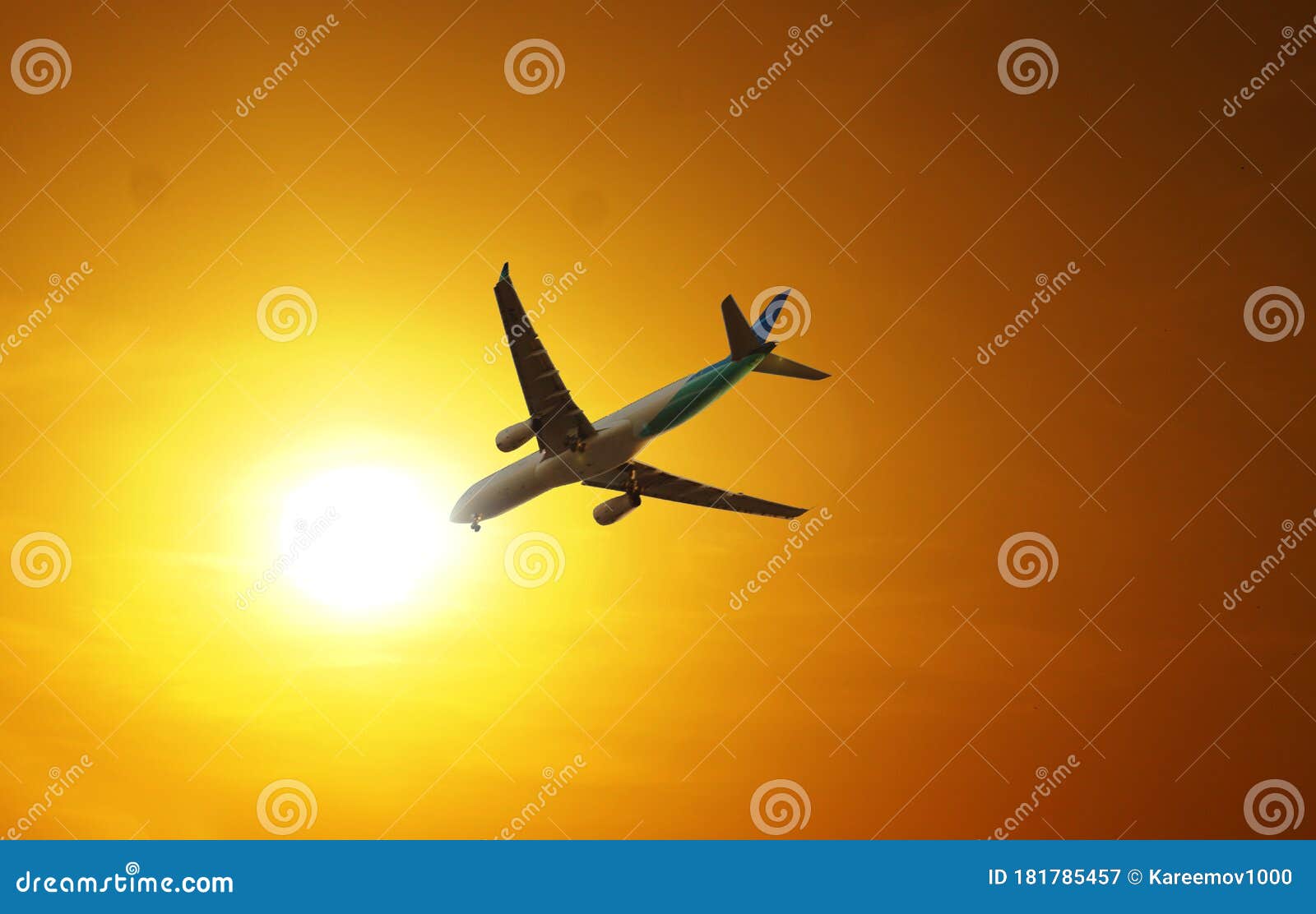 Airplane Flies Over The Clouds In The Sky. View Of The Fuselage, Wings ...