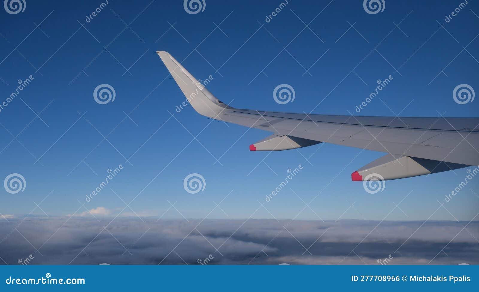 Airplane in Flight. People Travelling. Aerial View from Plane Window ...