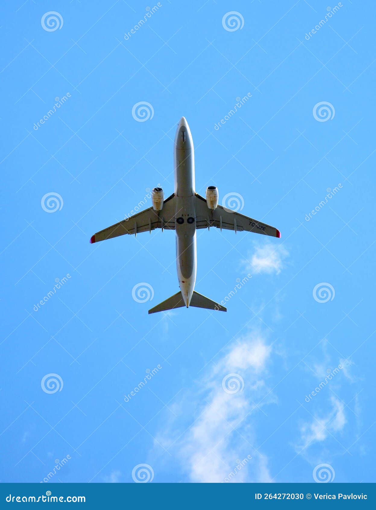 Airplane in Flight. a View of the Fuselage and the Blue Sky Background ...