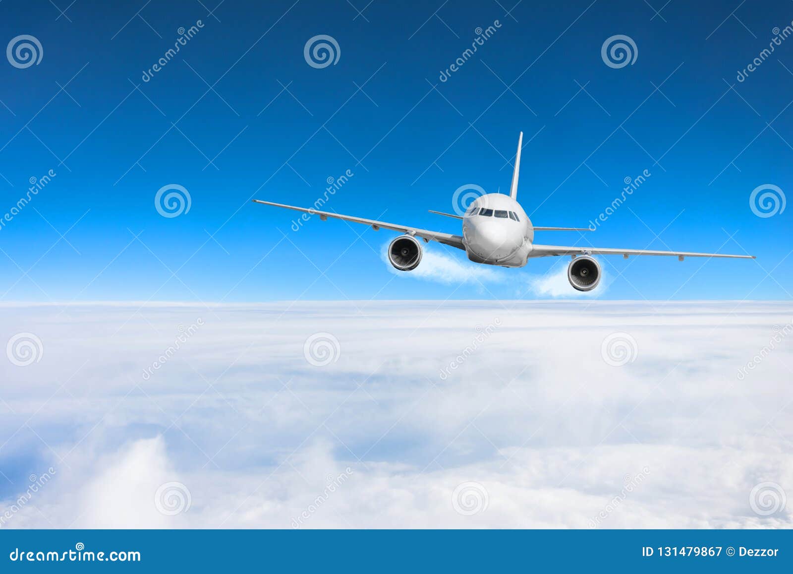 Airplane Fly Over the Clouds and the Earth`s Surface Under the Blue Sky ...