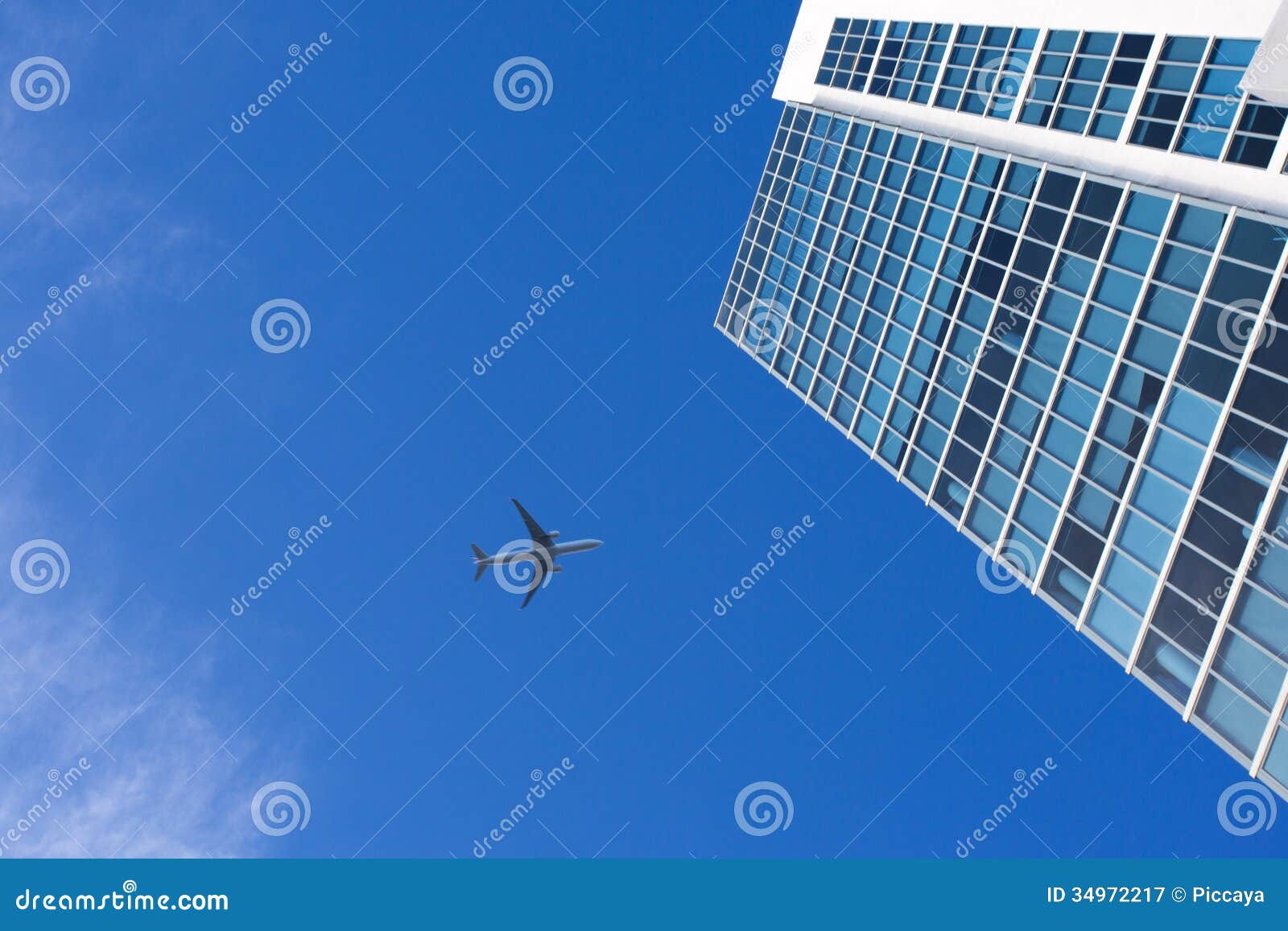 Airplane Flying Above a Skyscraper Stock Image - Image of exterior ...