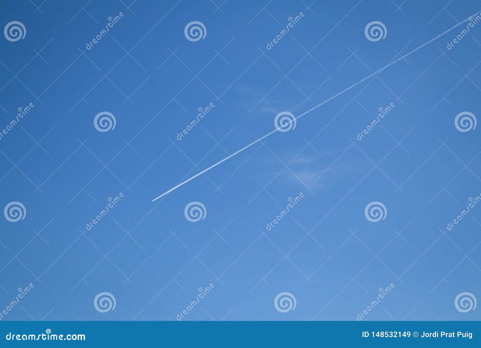 Airplane Flying Across a Solid Blue Sky Stock Image - Image of blue ...