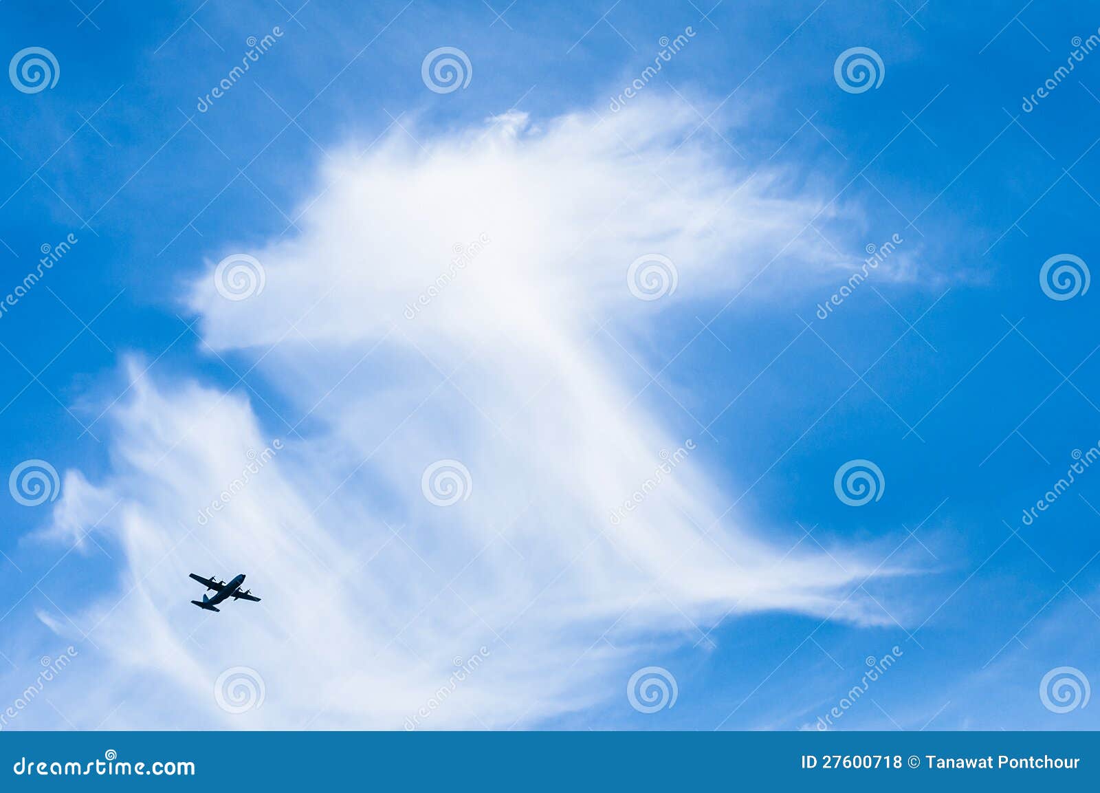 An Airplane Flying in the Blue Sky Stock Photo - Image of outdoors ...