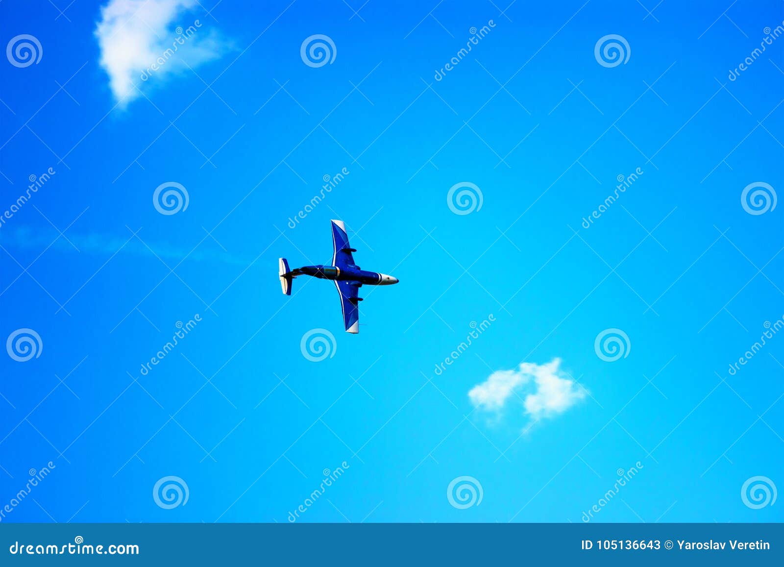 Airplane Flying in the Blue Sky among Clouds Stock Image - Image of ...