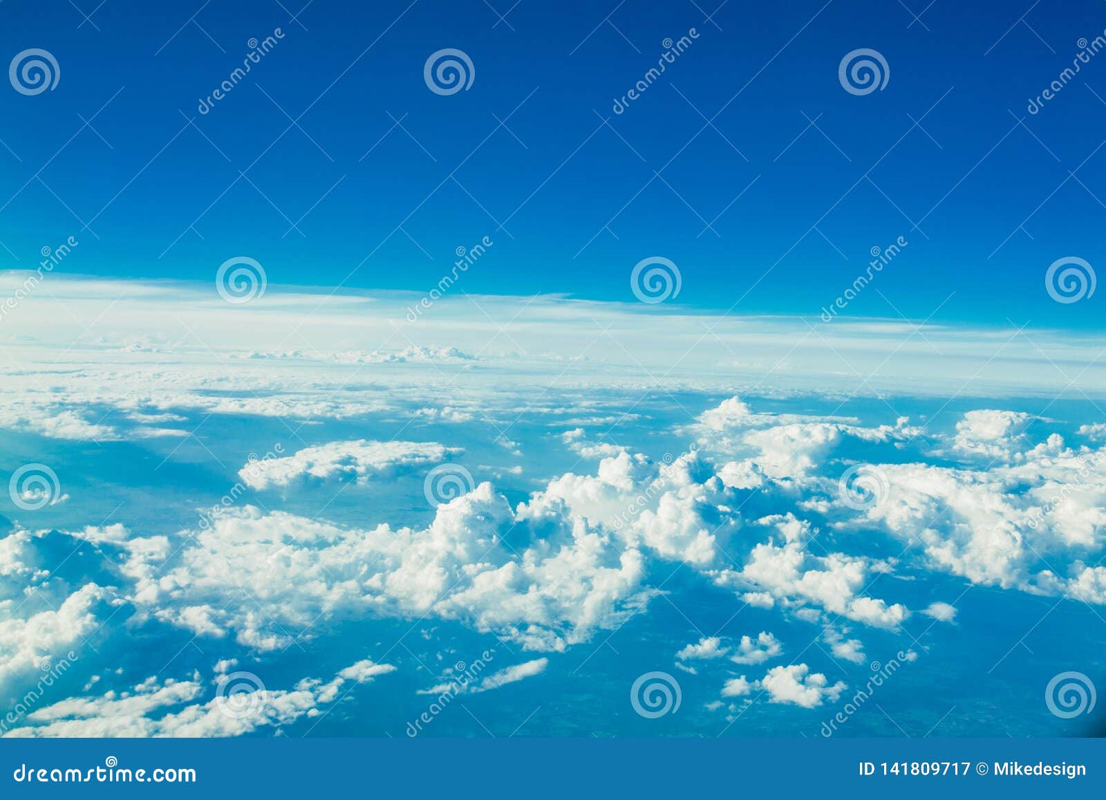 Airplane Flying in the Blue Sky among White Clouds Stock Image - Image ...