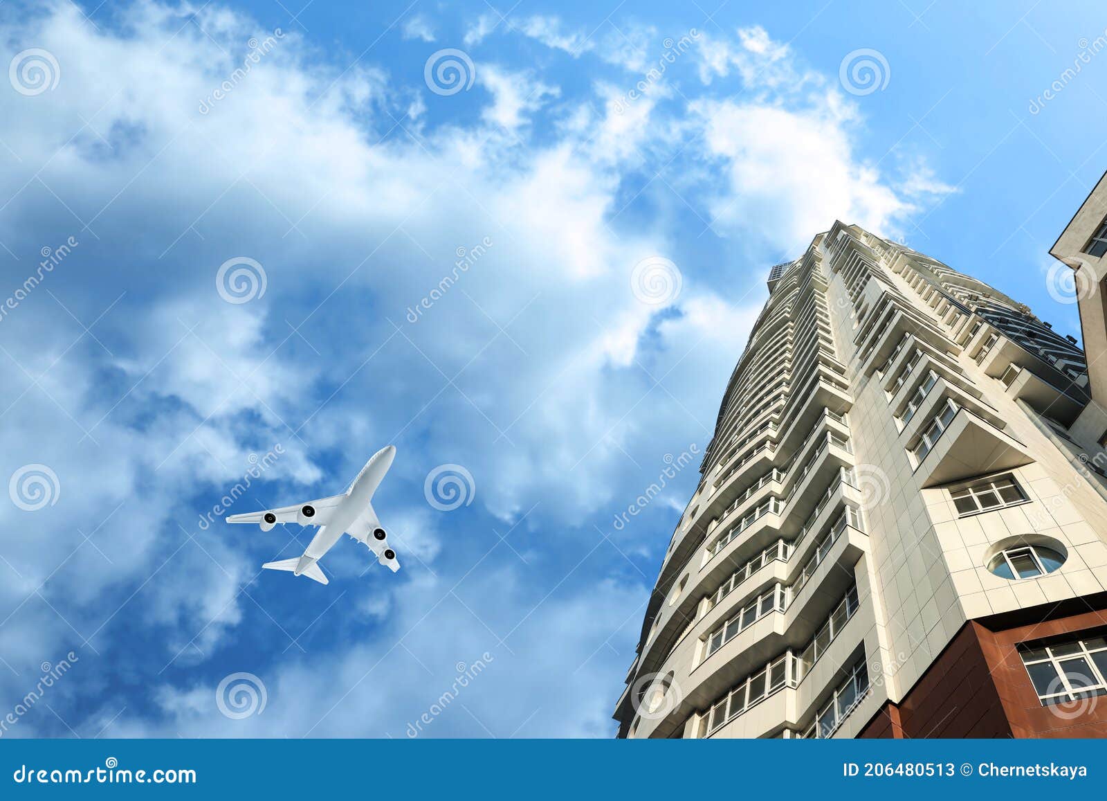 Airplane Flying in Blue Sky Over Skyscraper Stock Image - Image of ...