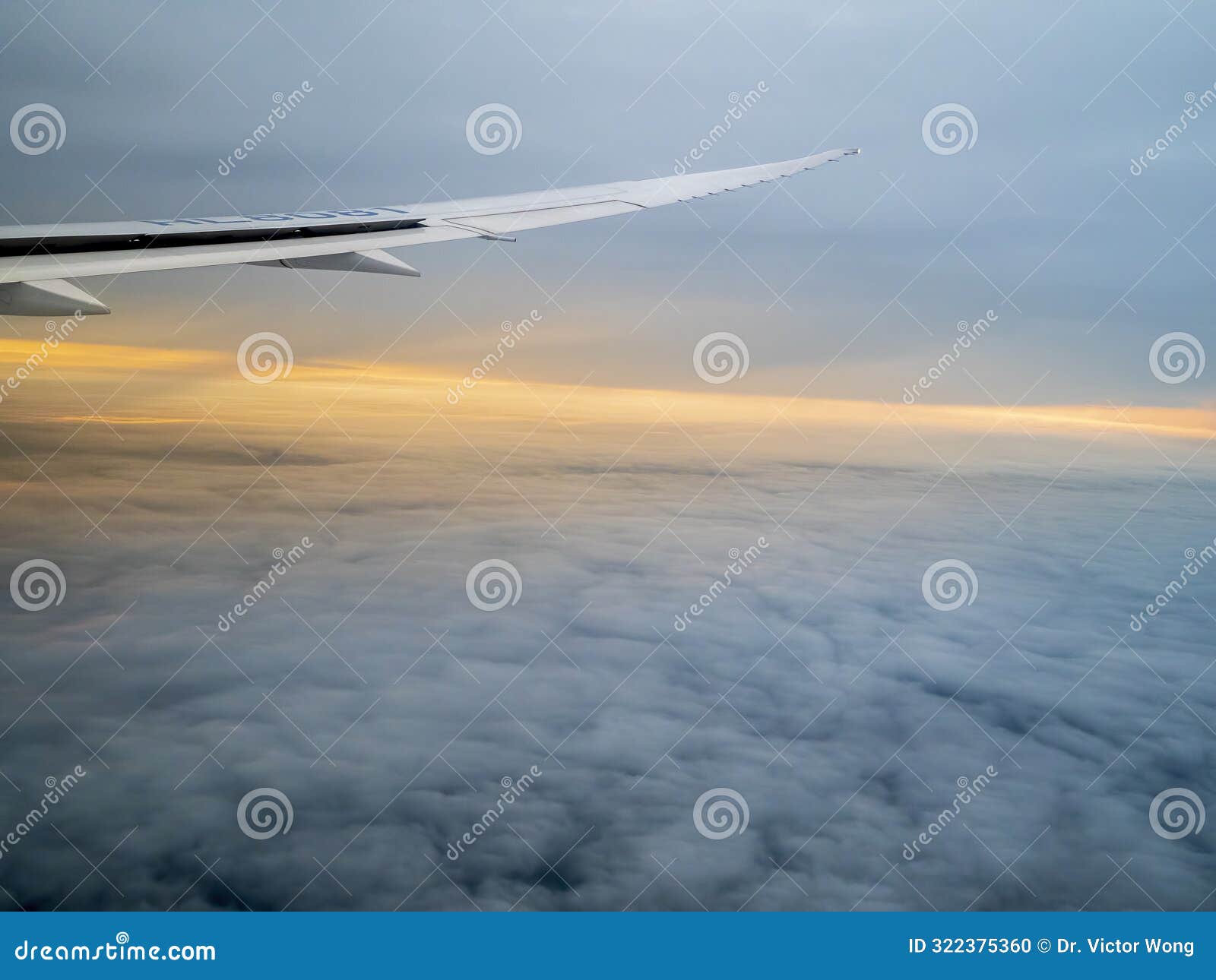 Airplane Flying between Cloud Layers Viewed from Passenger Cabin Window Stock Photo - Image of ...
