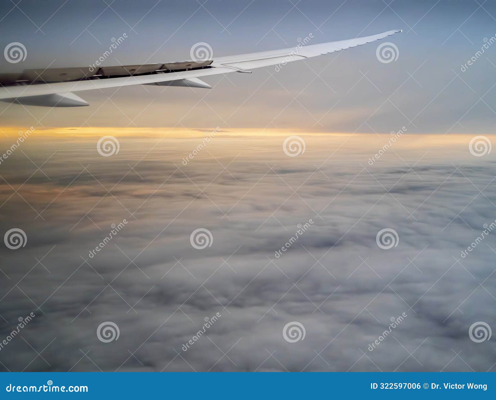 Airplane Flying between Cloud Layers Viewed from Passenger Cabin Window ...