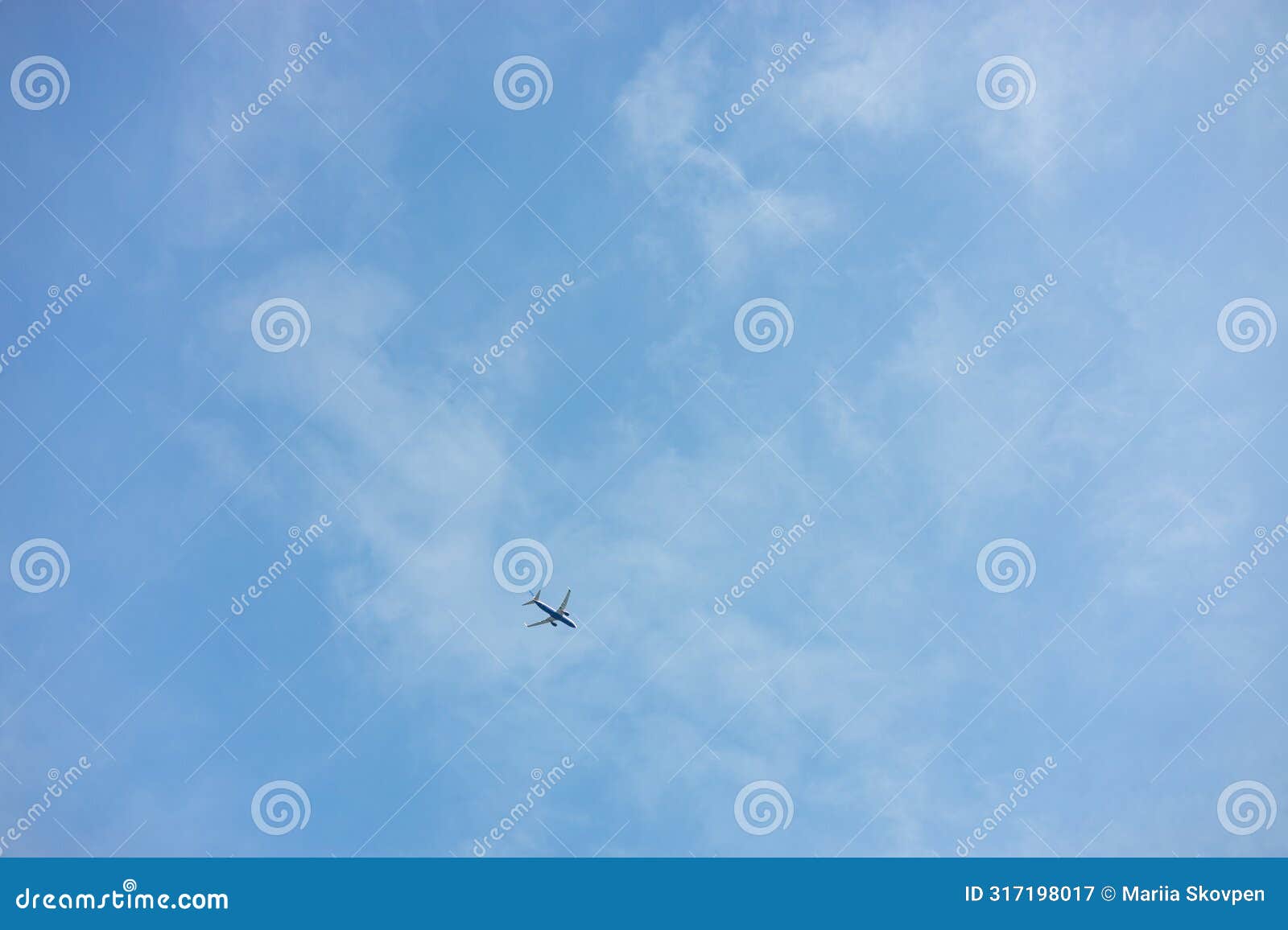 Airplane Flying in the Cloudy Blue Sky, Bottom View Stock Image - Image ...