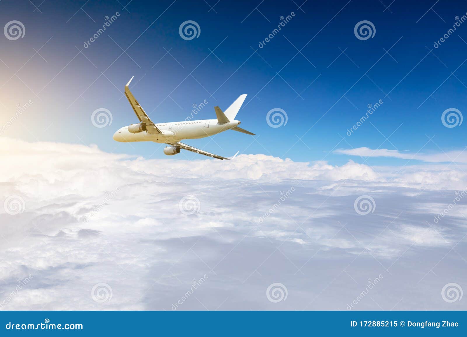 Airplane Flying at High Altitude and Beautiful High-altitude Clouds ...