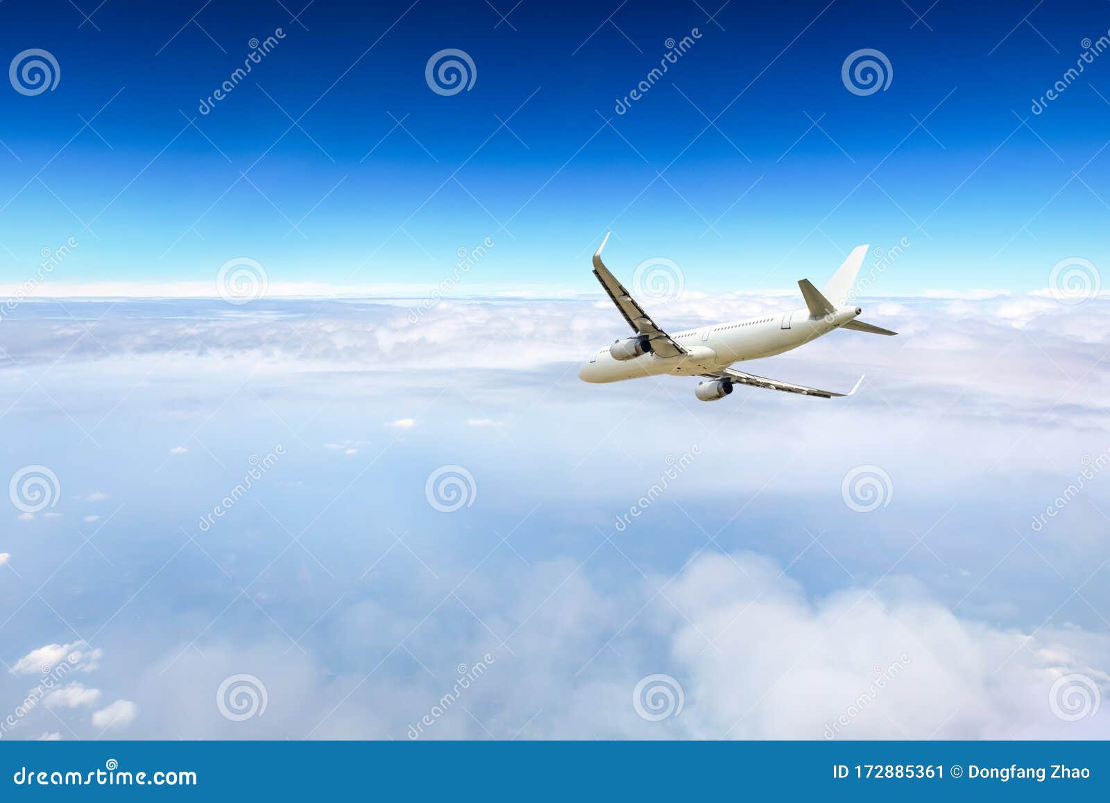Airplane Flying at High Altitude and Beautiful High-altitude Clouds ...