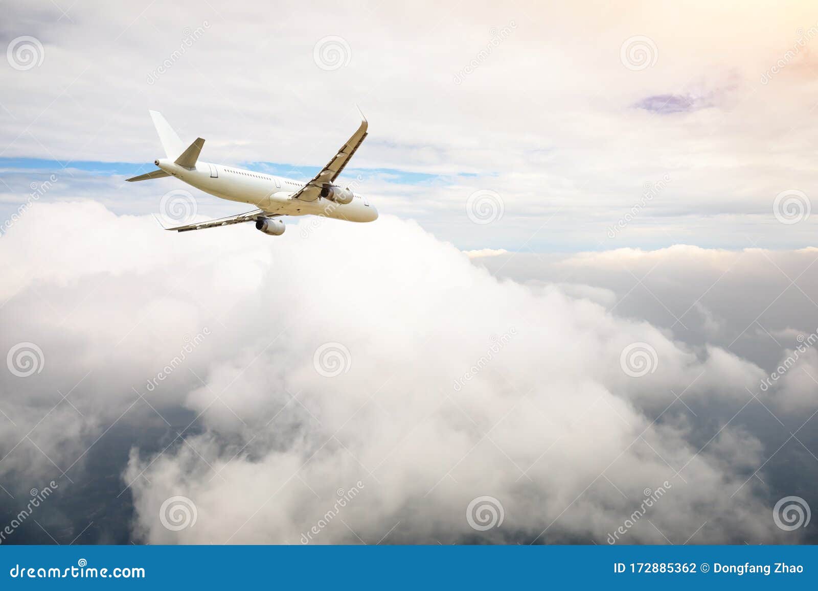Airplane Flying at High Altitude and Beautiful High-altitude Clouds ...