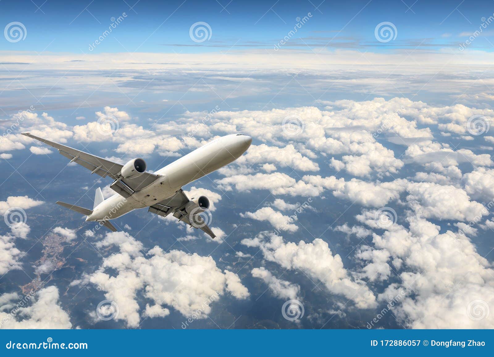 Airplane Flying at High Altitude and Beautiful High-altitude Clouds ...