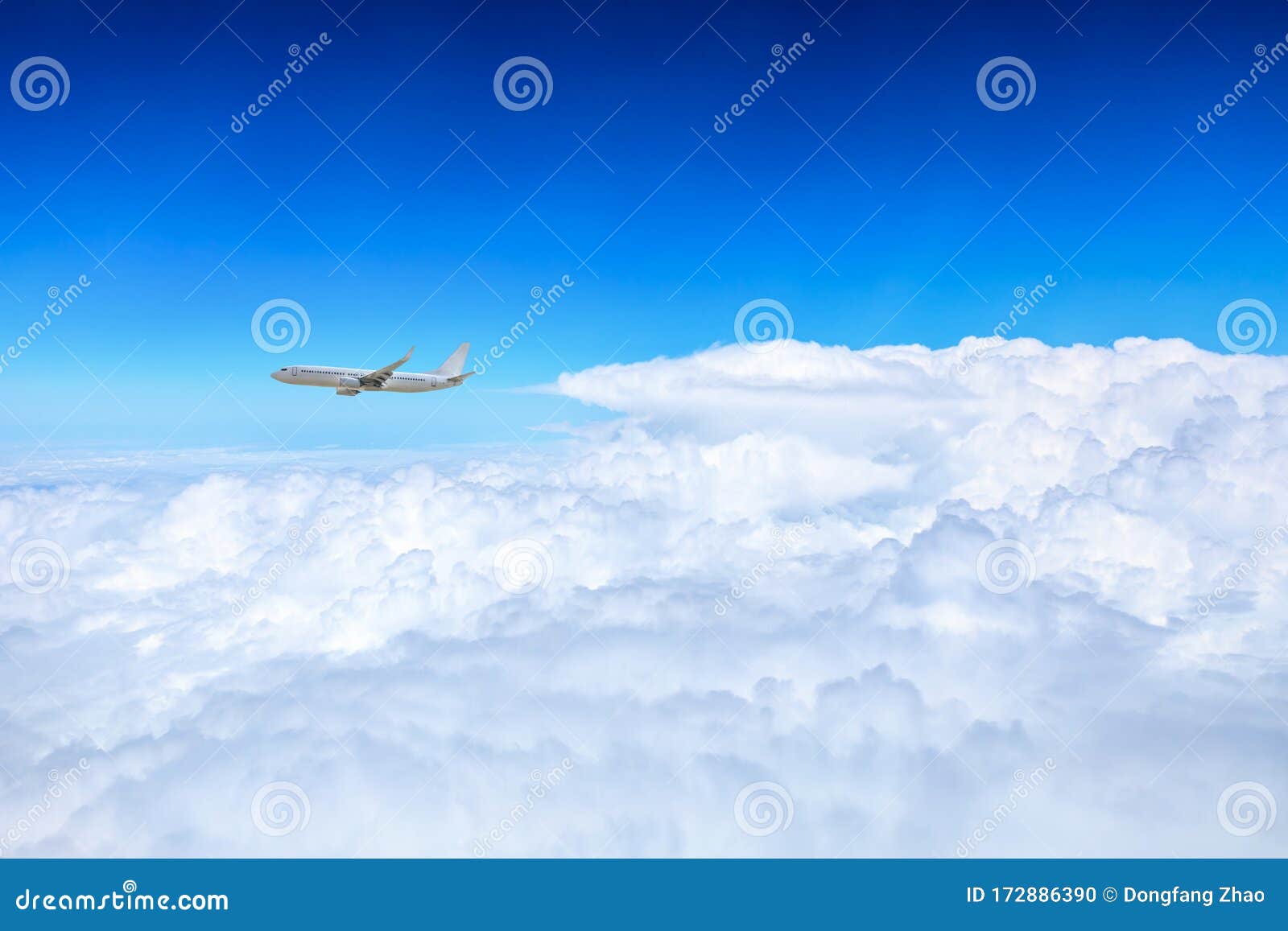Airplane Flying at High Altitude and Beautiful High-altitude Clouds ...
