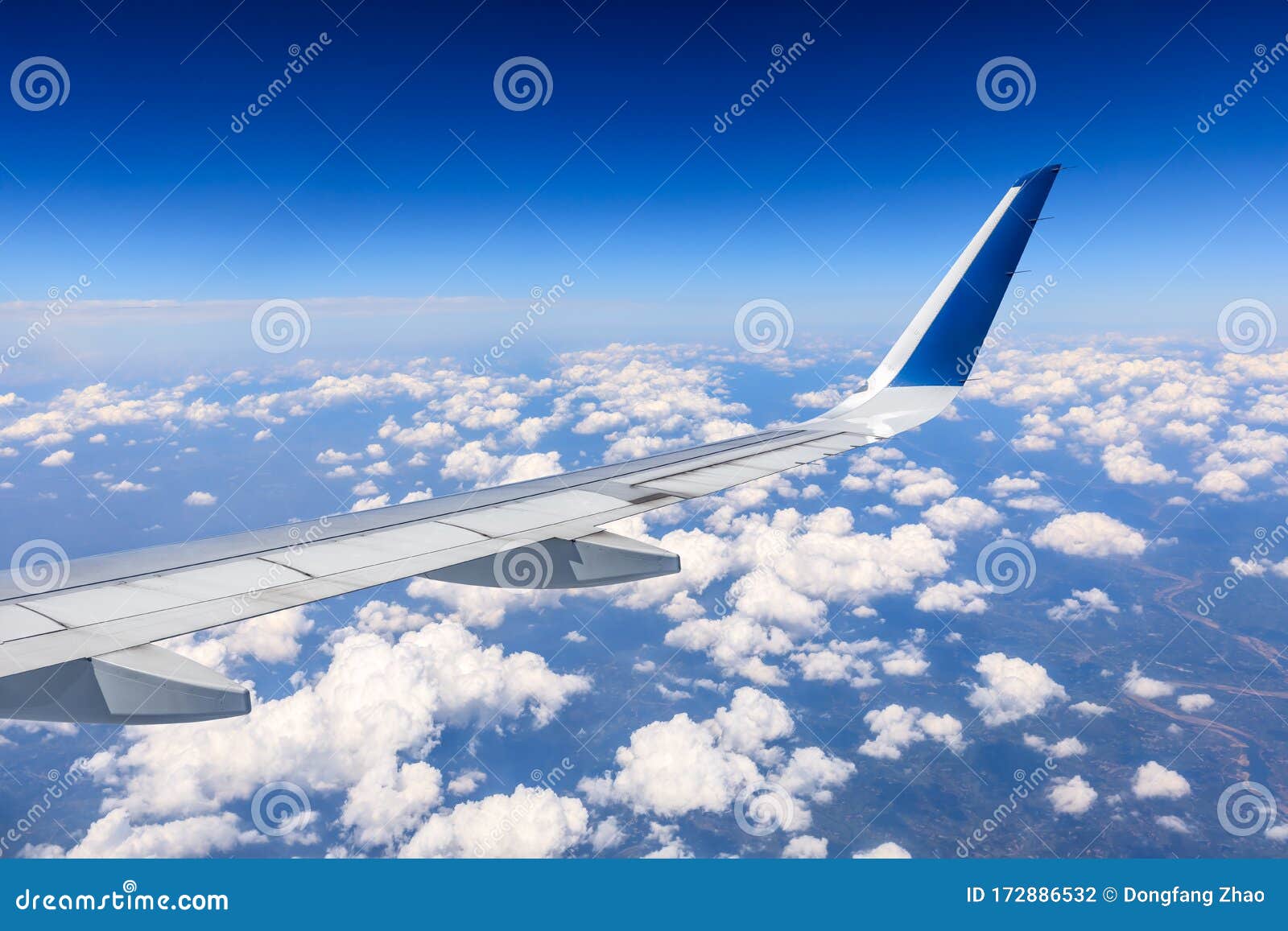 Airplane Flying at High Altitude and Beautiful High-altitude Clouds ...