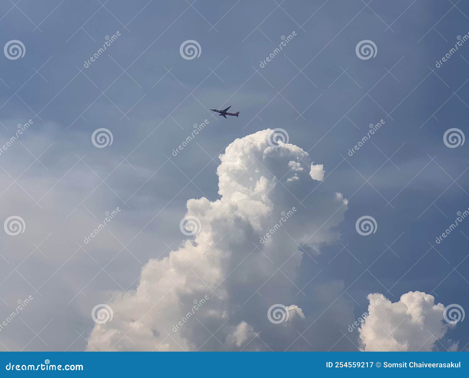Airplane Flying Over the Clouds in the Sky Stock Image - Image of ...