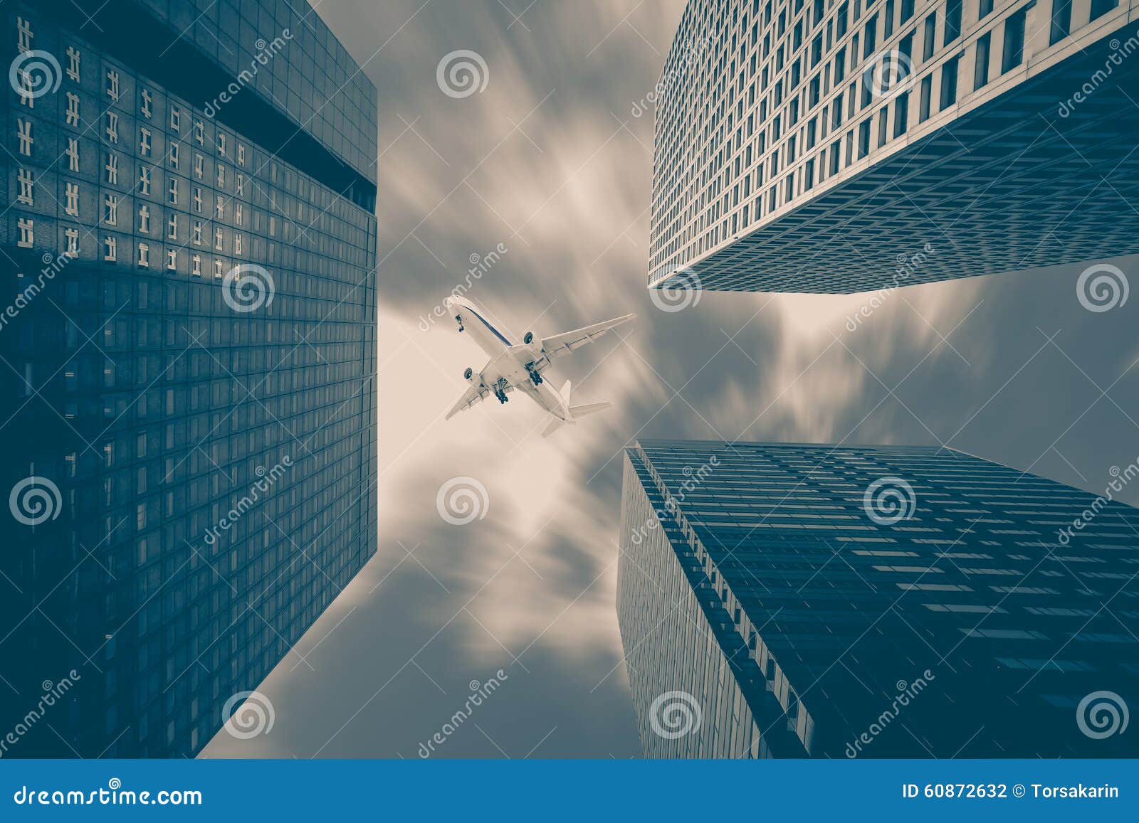 Airplane Flying Over High Rise Building Stock Photo - Image of place ...