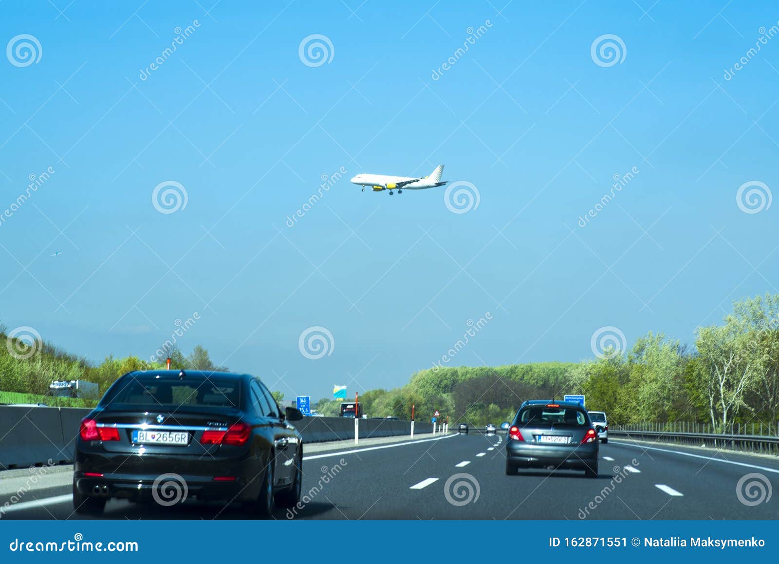 2019 Austria.Airplane Flying Over Highway Road.the Plane Flies Over the ...