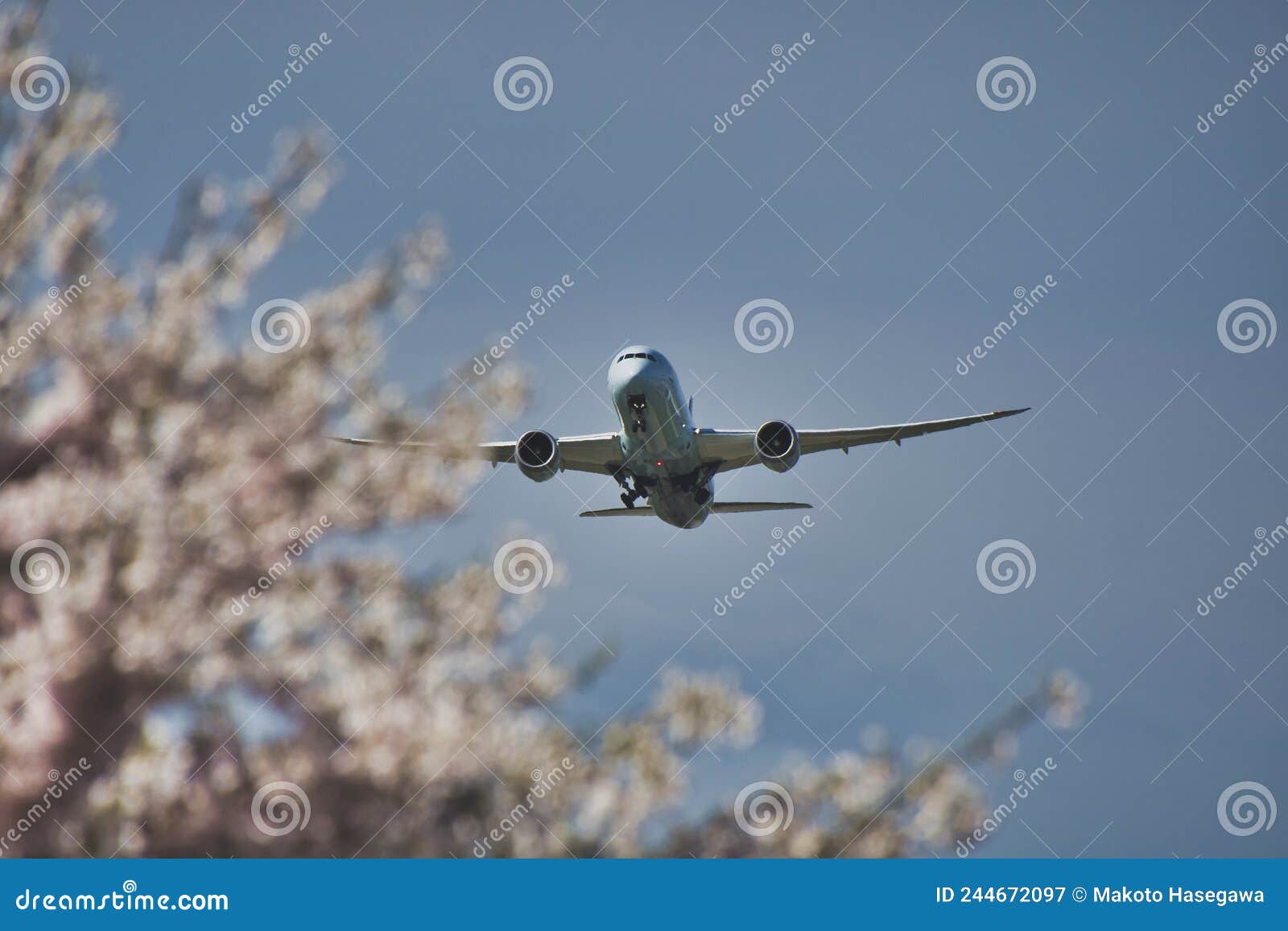 An Airplane Flying in the Spring Sky. Richmond BC Canada Stock Image ...