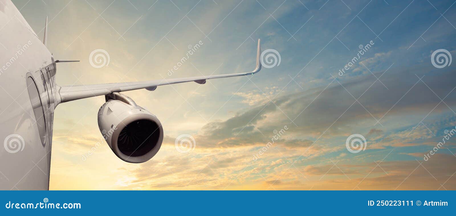 Airplane Flying at Sunset Sky with Sun Light and Clouds Stock Image ...