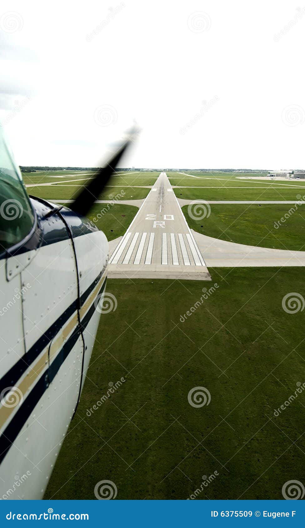 Airplane Flying Toward Ground Stock Image - Image of runway, bright ...