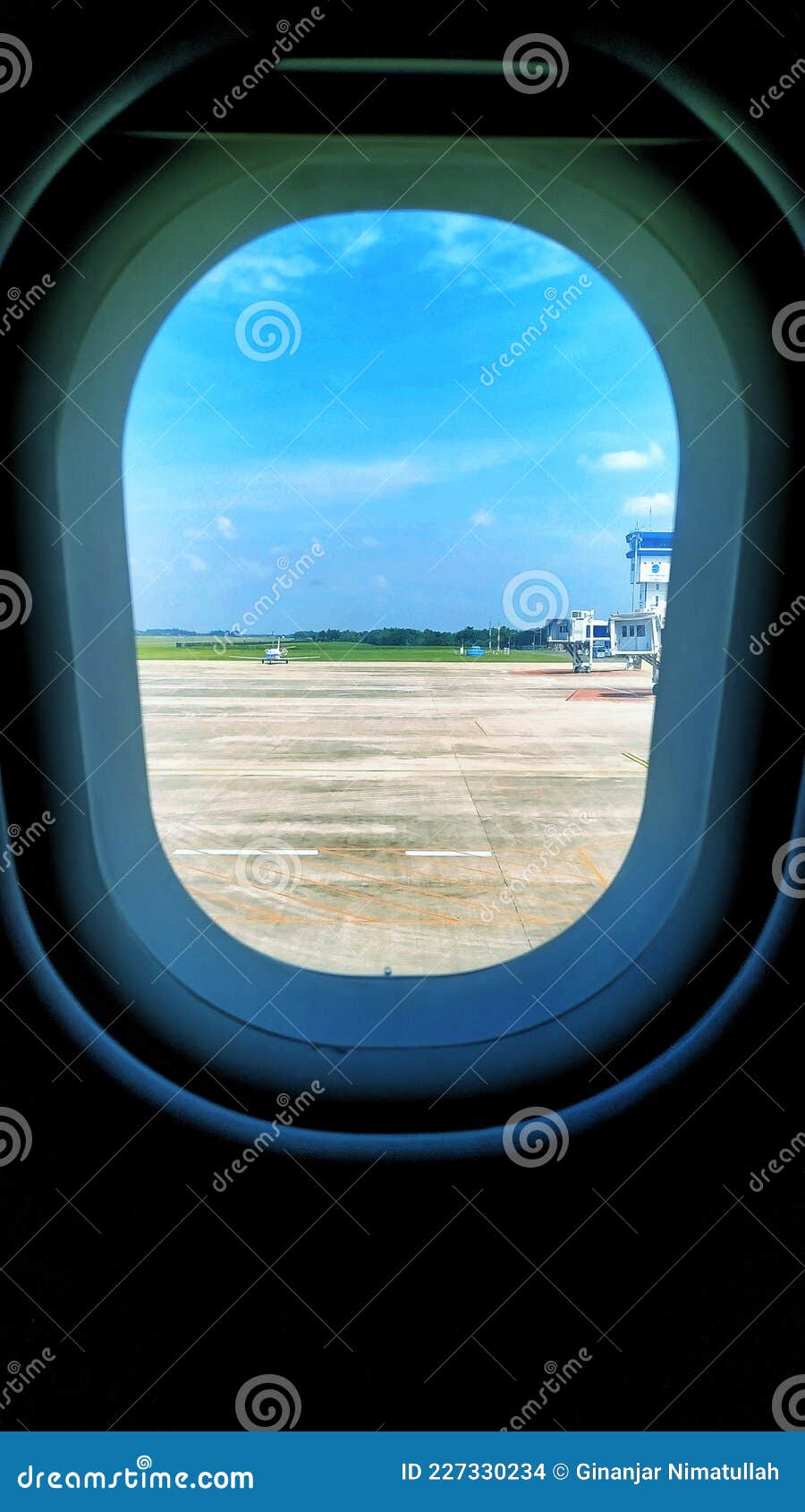 Airplane glass window stock photo. Image of lighting - 227330234