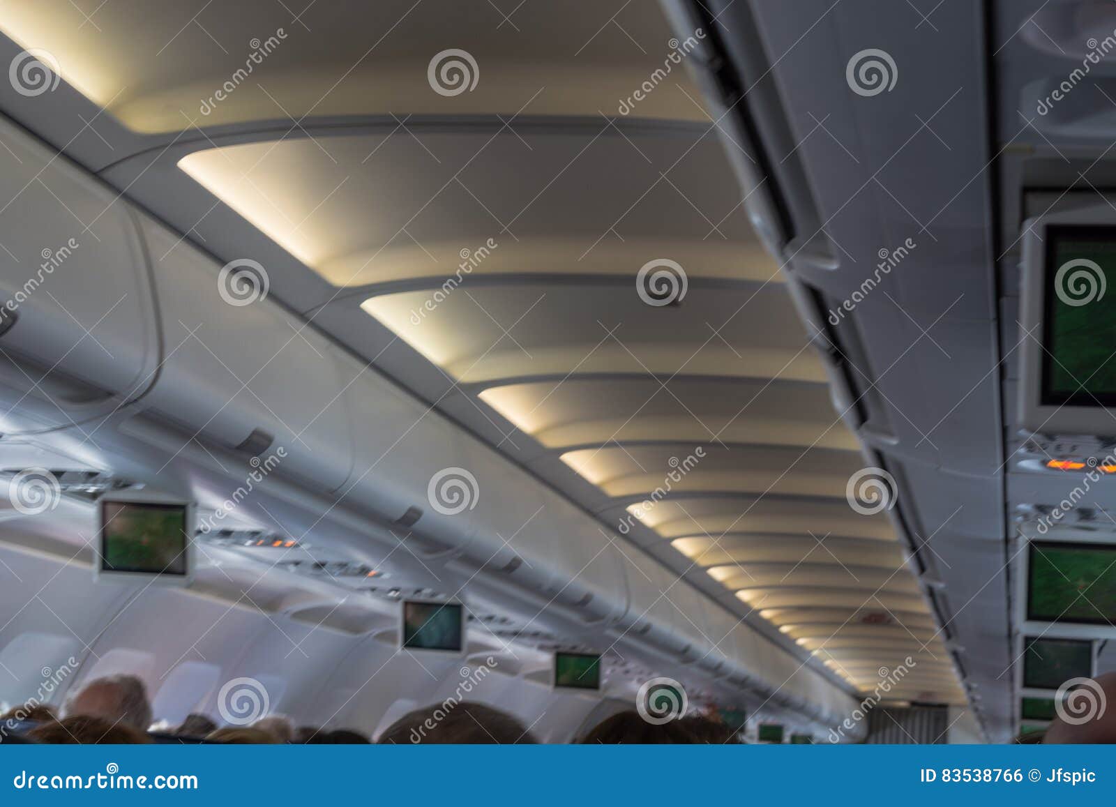 Airplane Interior with Passengers Stock Photo - Image of gear, boarding ...