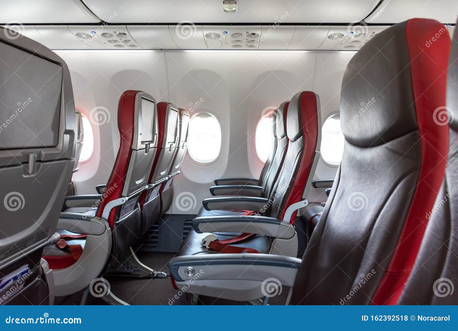 Airplane interior seats stock photo. Image of journey - 162392518