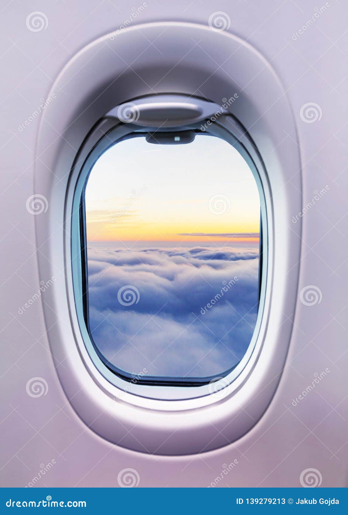 Airplane Interior with Window View of Sunset Above Clouds Stock Image ...