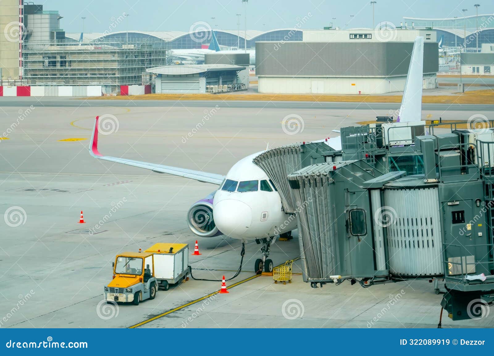 Airplane Jet Connected To Terminal Via Jet Bridge Stock Image - Image ...