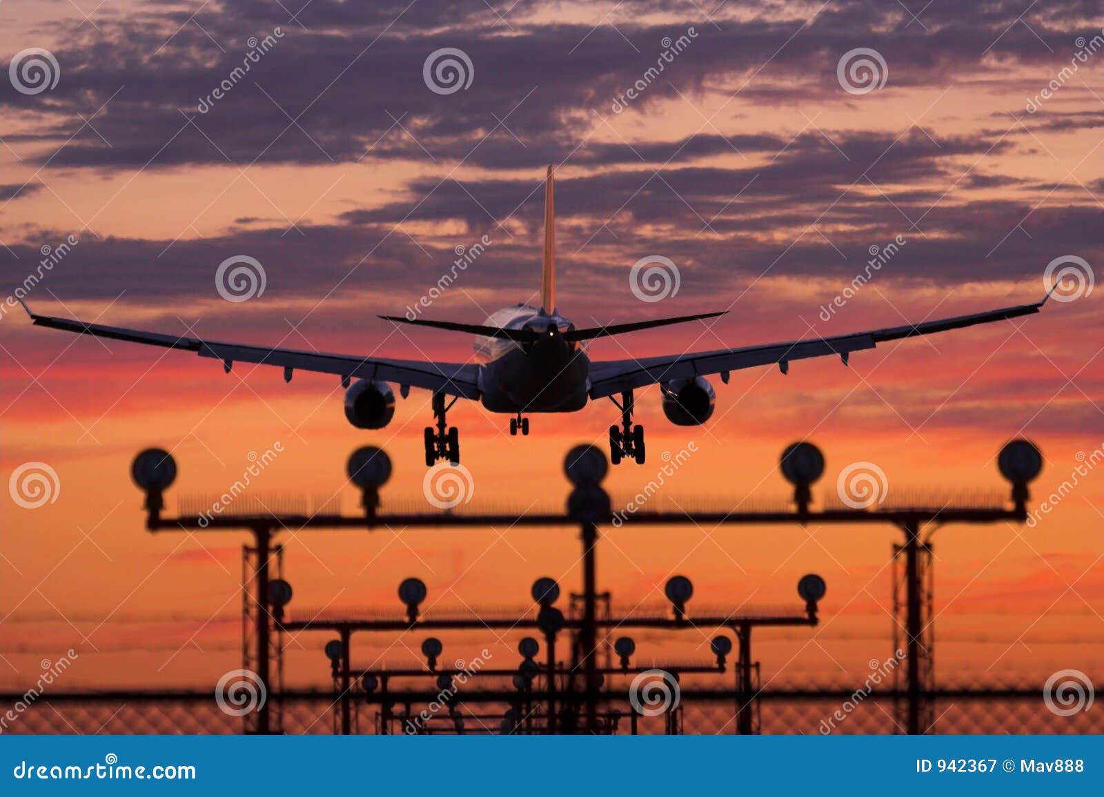 Airplane landing stock image. Image of airport, dusk, clouds - 942367