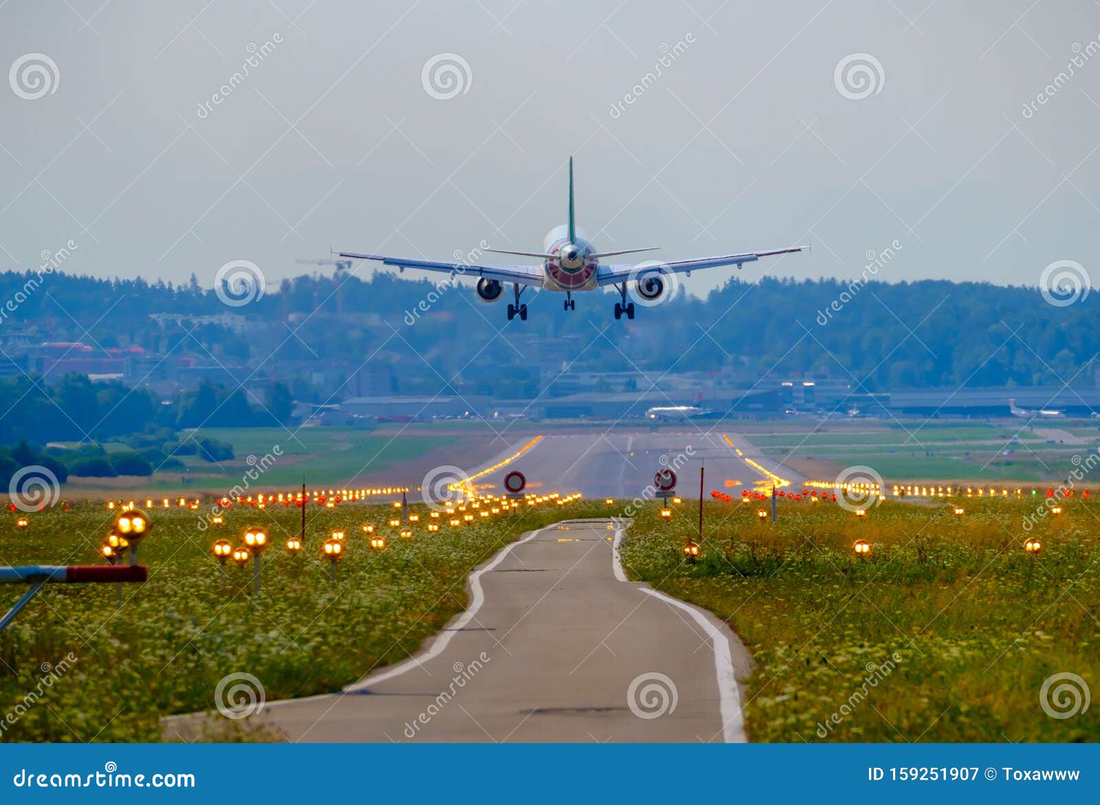 Airplane Landing at Airport Runway Stock Image - Image of landing ...
