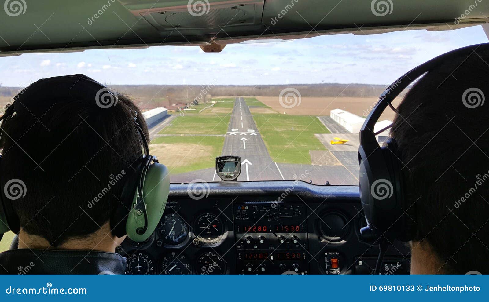 Airplane Student and Flight Instructor Landing on Runway Stock Image ...
