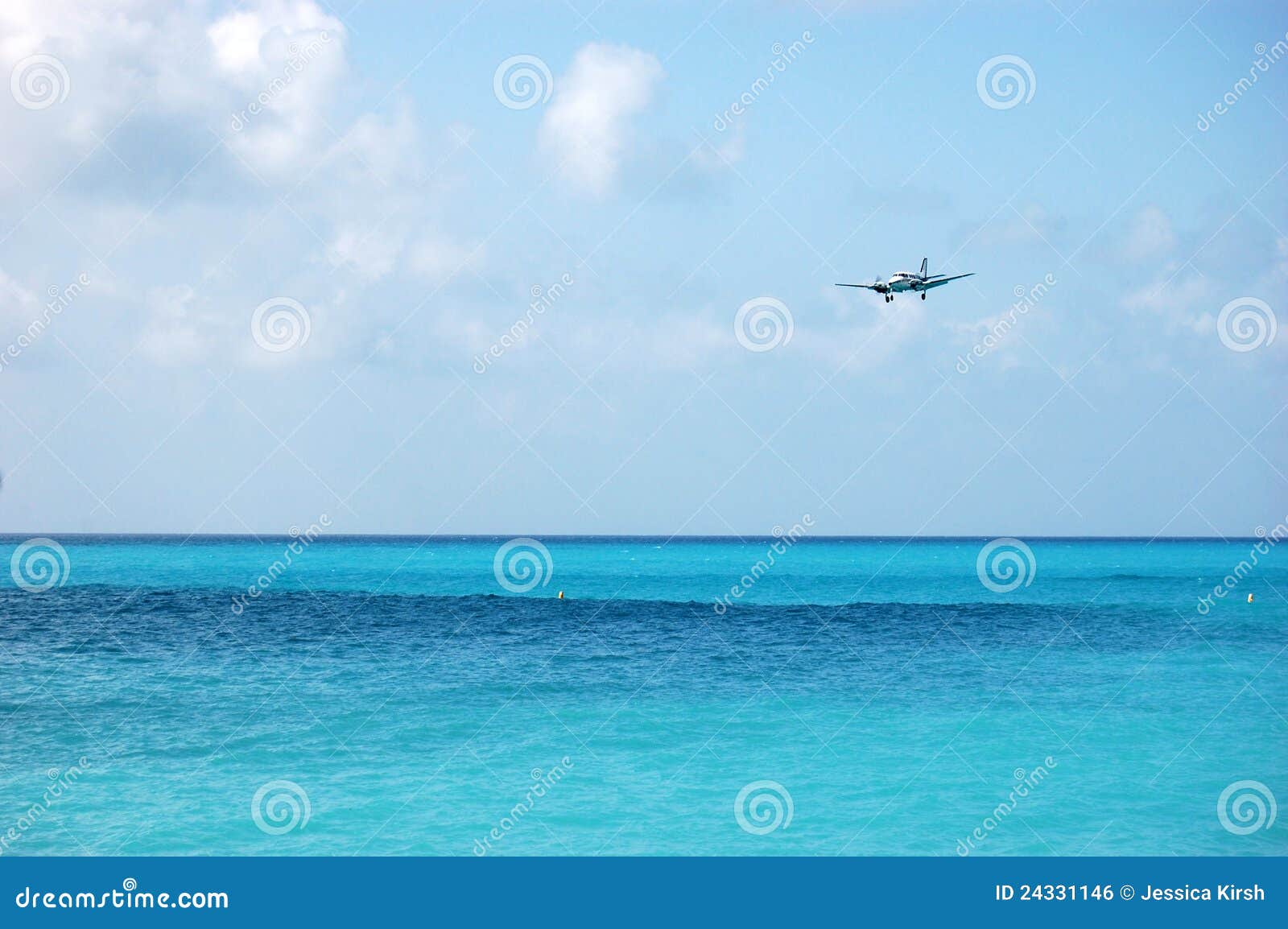Airplane Landing over Sea stock photo. Image of calm - 24331146