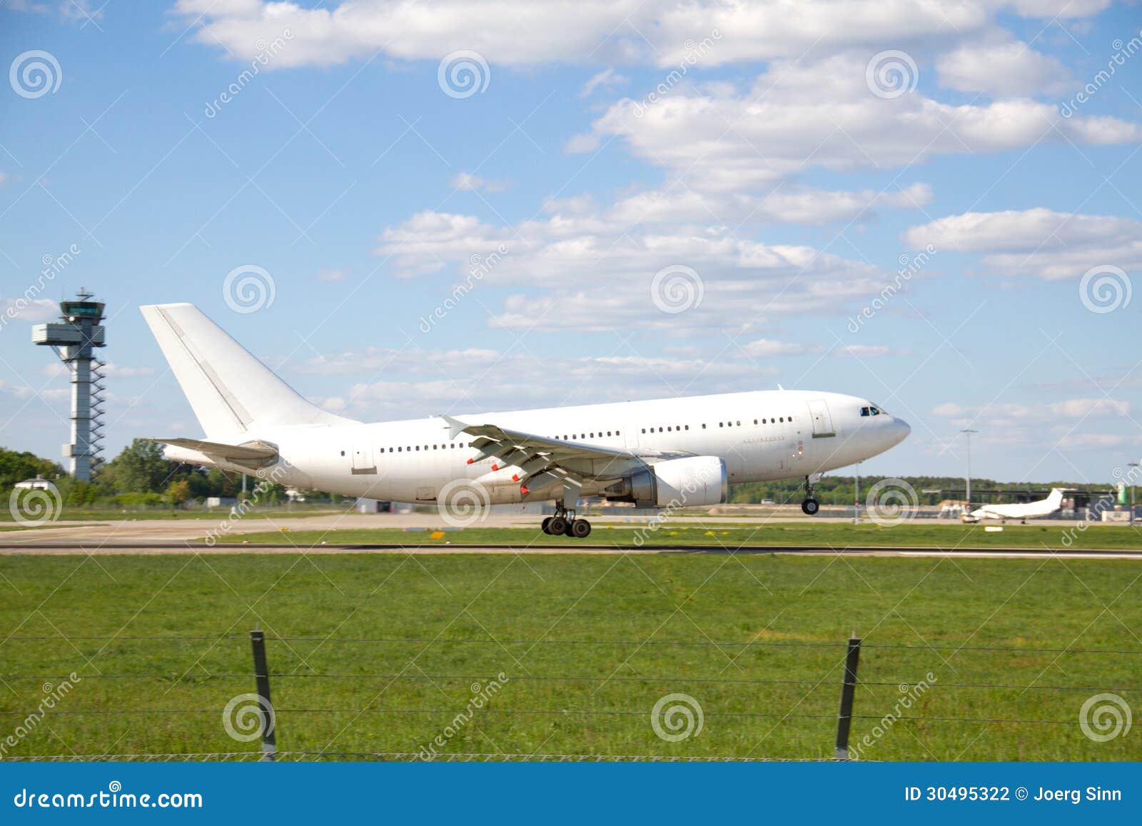 Airplane landing on runway stock photo. Image of aircraft - 30495322